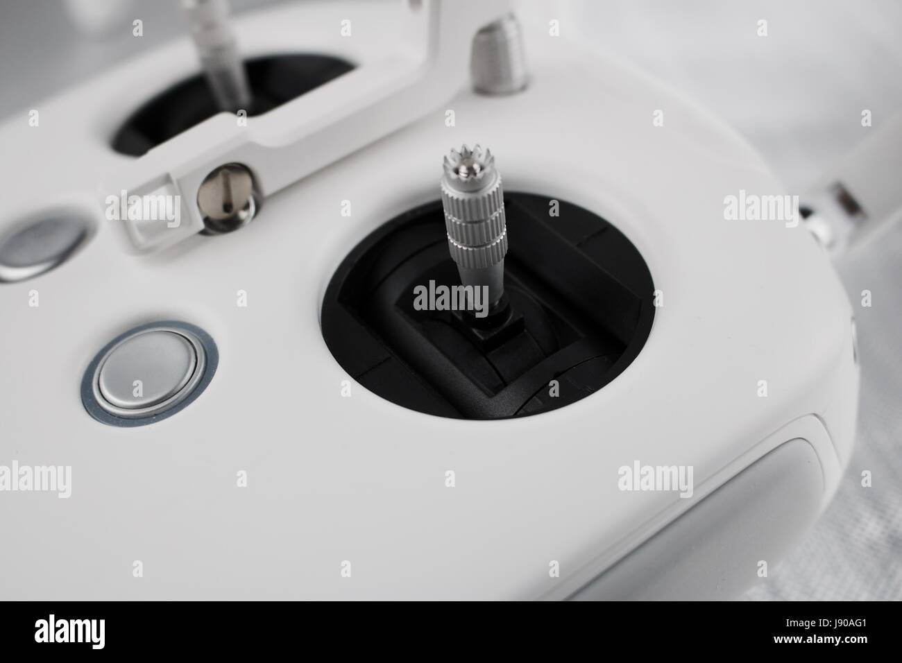 Aerial vehicles. White big drone controller with a holder for wireless ...