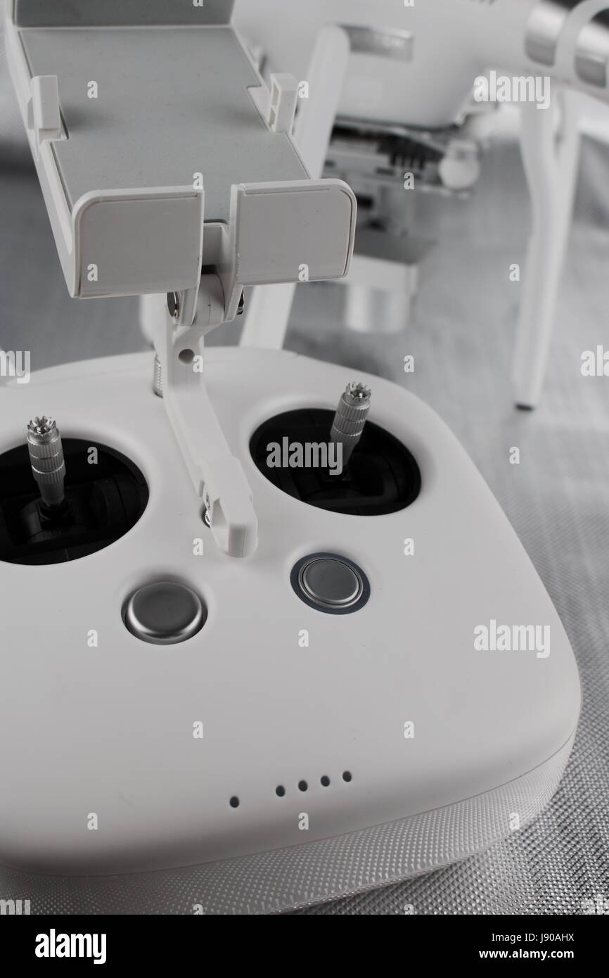 Big black and white hand aircraft controller, and quadcopter in ...