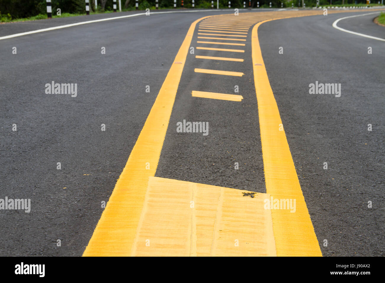 Twin Yellow line Stock Photo - Alamy