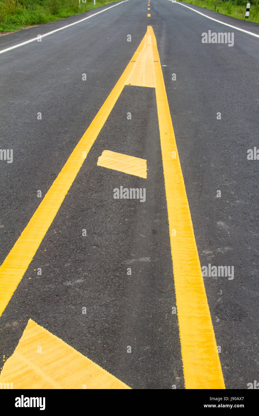 Twin Yellow line Stock Photo - Alamy
