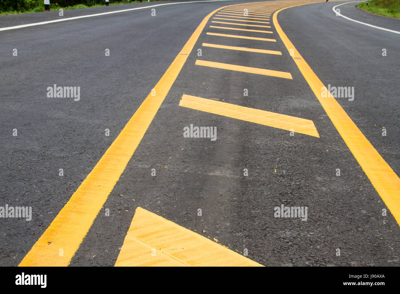 Twin Yellow line Stock Photo - Alamy