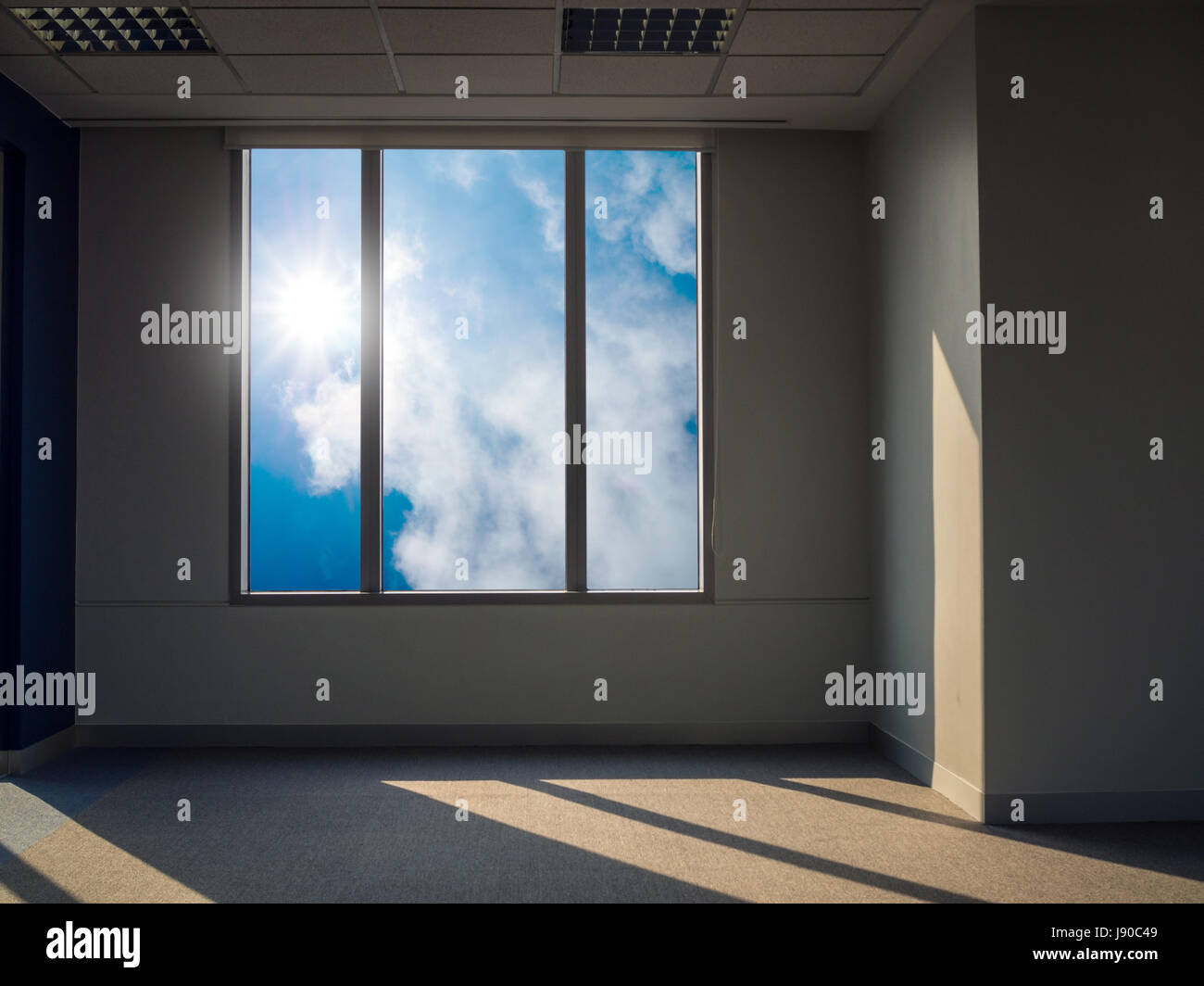 Man looking window office exterior hi-res stock photography and images ...