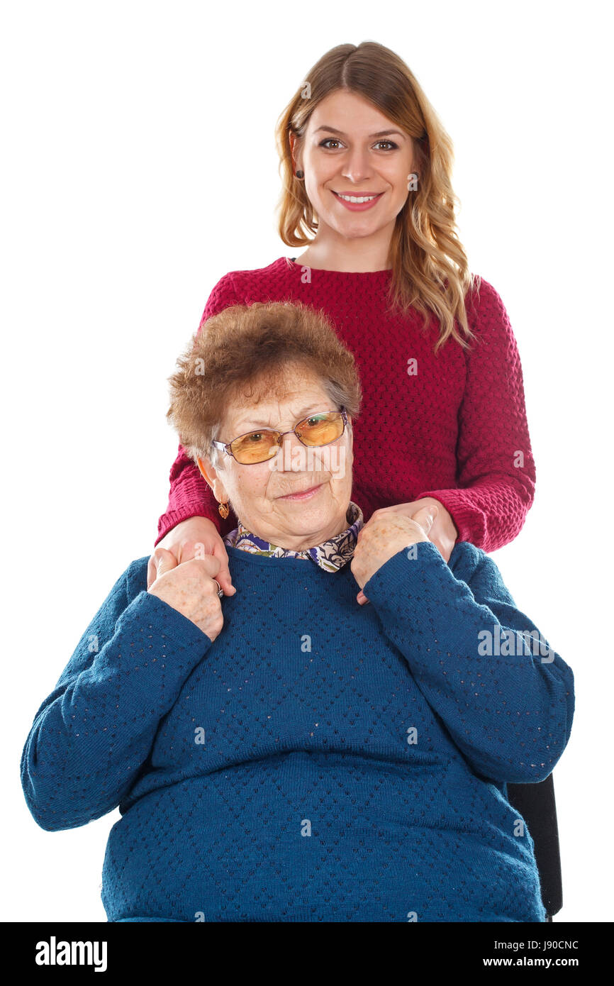 Picture of a kind woman helping an old lady - isolated background Stock ...