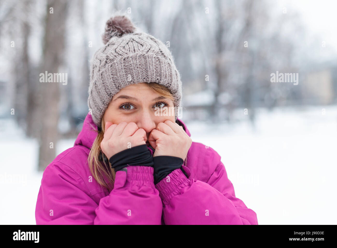 Picture of a cute young girl being cold outside Stock Photo - Alamy