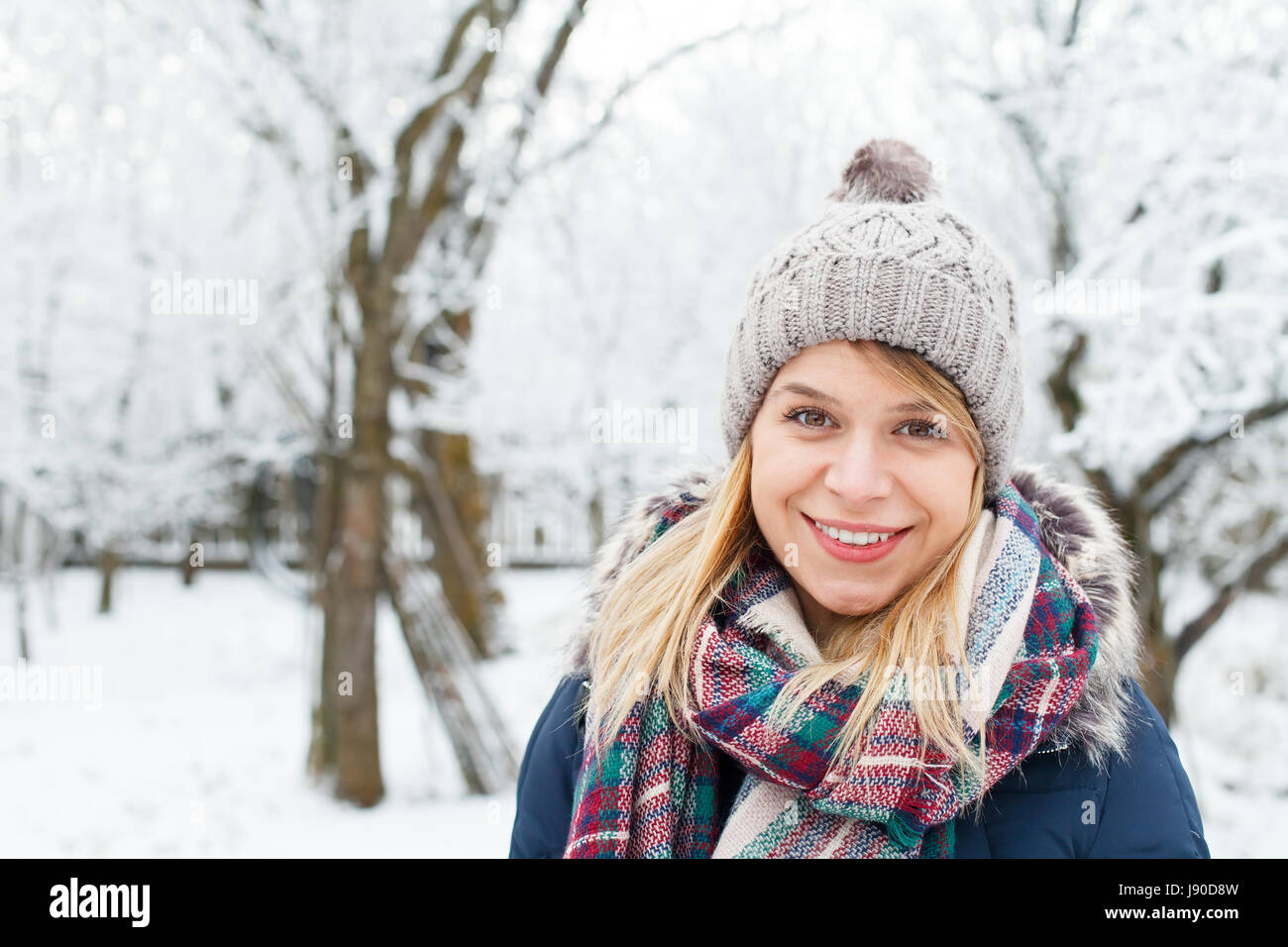 Picture of a young woman being cold outside on wintertime Stock Photo ...
