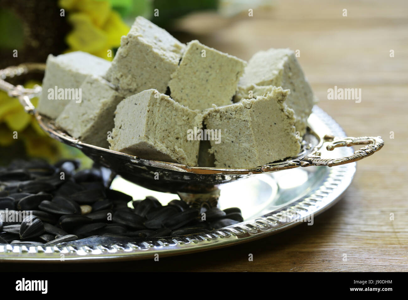 Oriental sweets halva from sunflower seeds with honey Stock Photo - Alamy