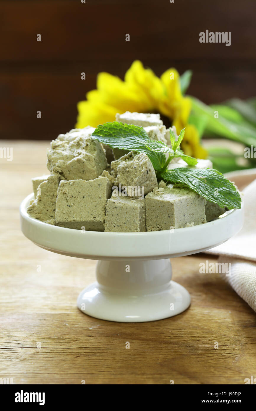 Oriental sweets halva from sunflower seeds with honey Stock Photo - Alamy