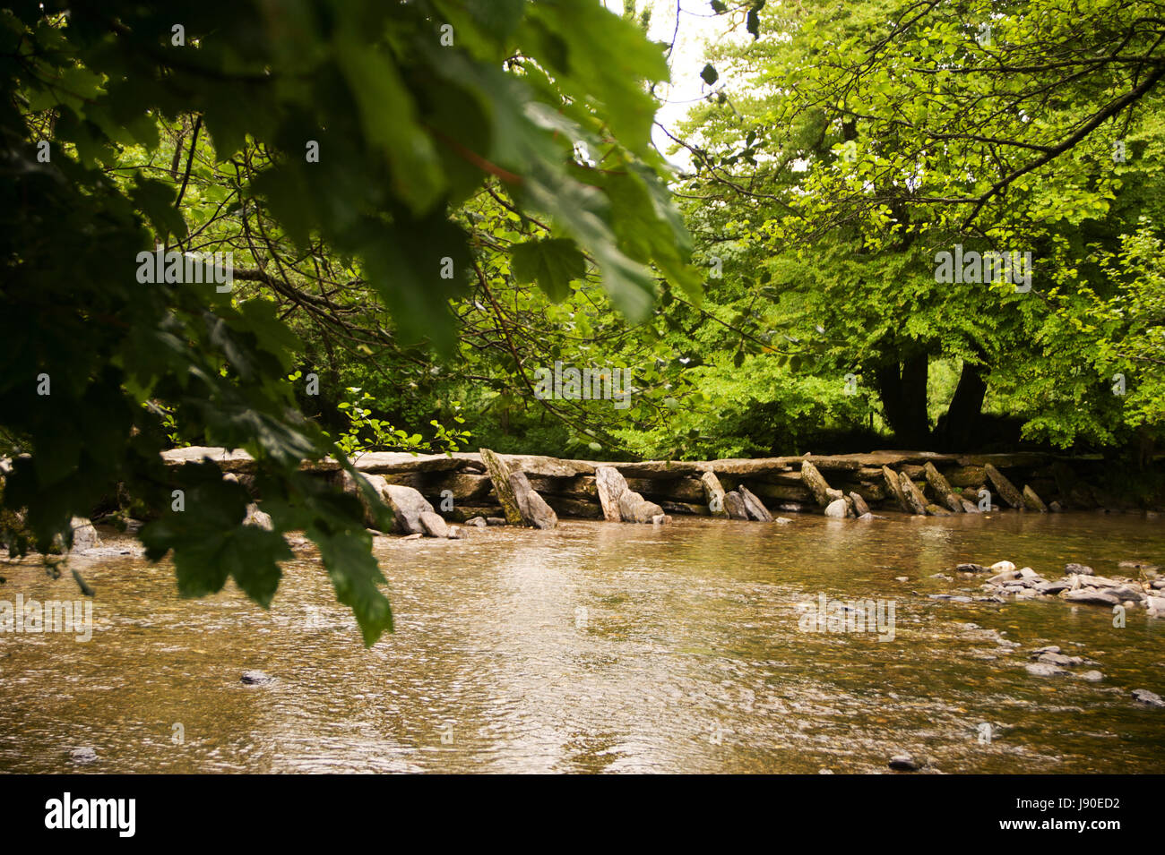 The Tarr Steps, clapper bridge across the River Barle in the Exmoor ...