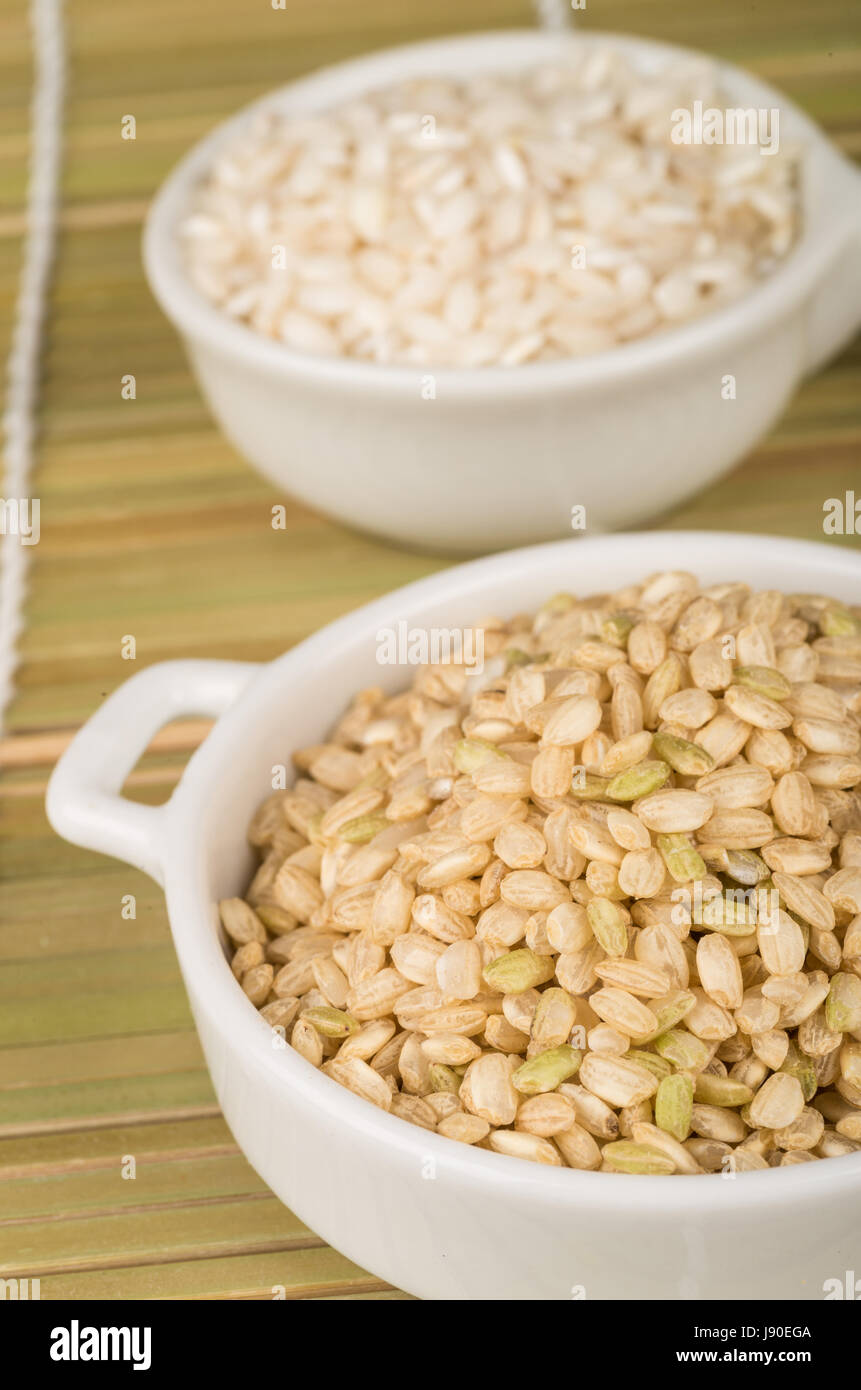 Whole and long grain white rice Stock Photo - Alamy