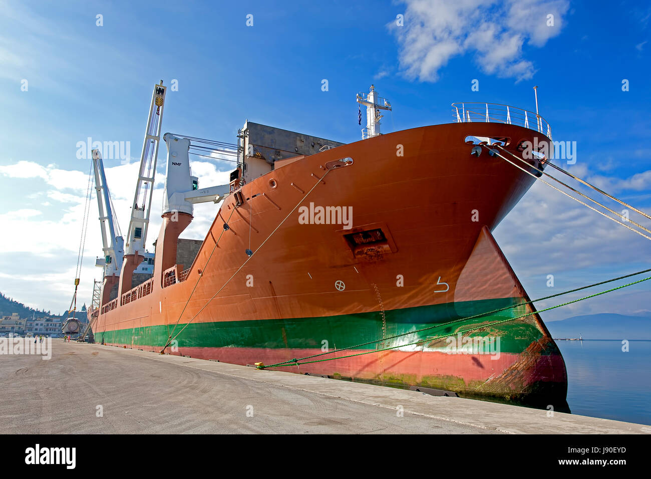 Large container ship in mediterranean coast Stock Photo - Alamy