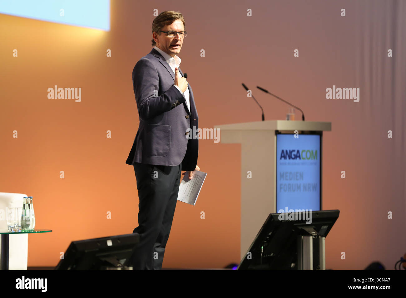 Claus Strunz, Journalist und Moderator, bei der Eroeffnung ANGA COM und ...