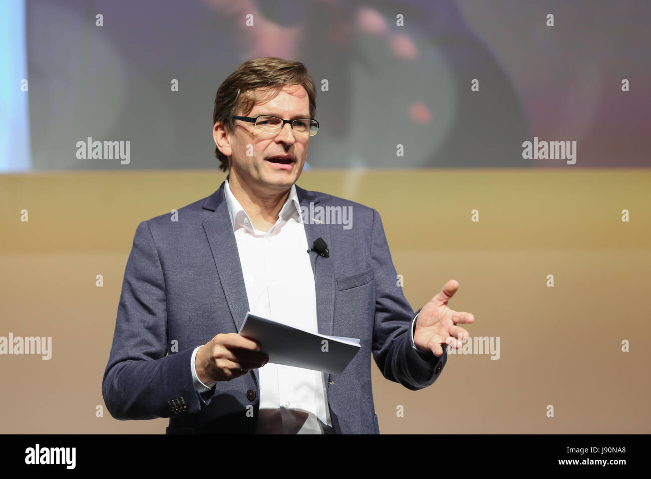 Claus Strunz, Journalist und Moderator, bei der Eroeffnung ANGA COM und ...