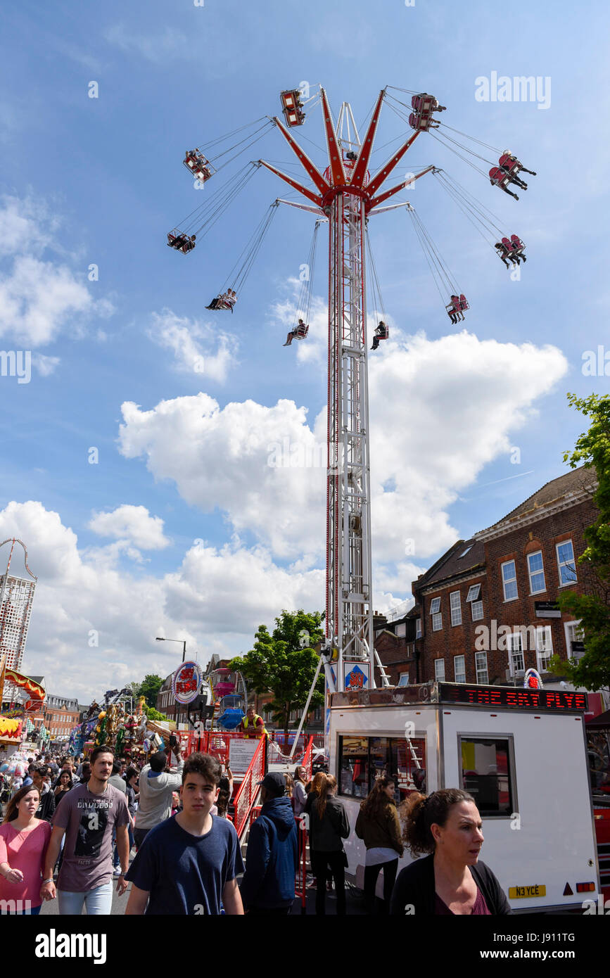 London, UK. 31 May 2017. Customers ride overhead on an aerial ride ...