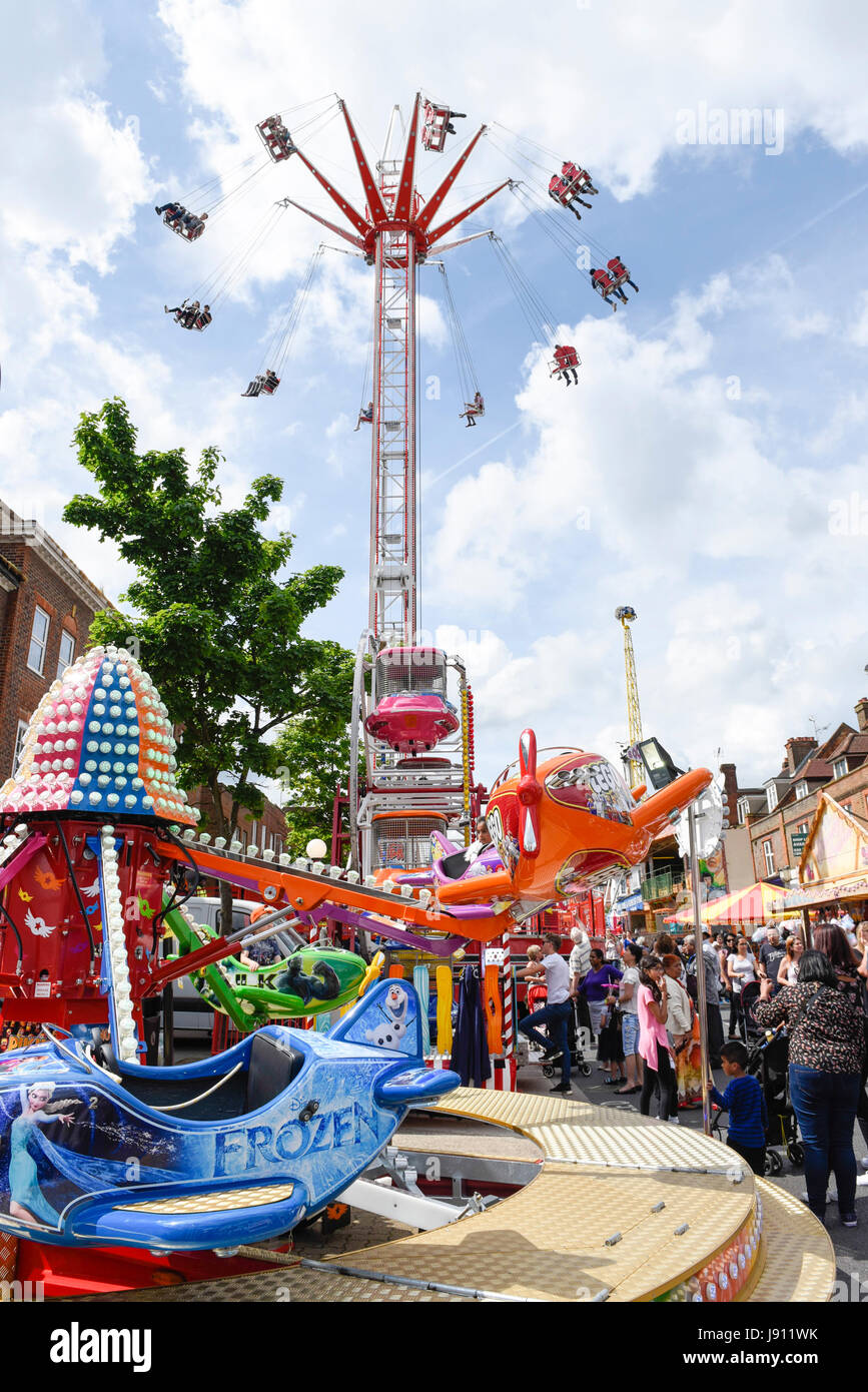 London, UK. 31 May 2017. Customers fly overhead on a spinning ride ...