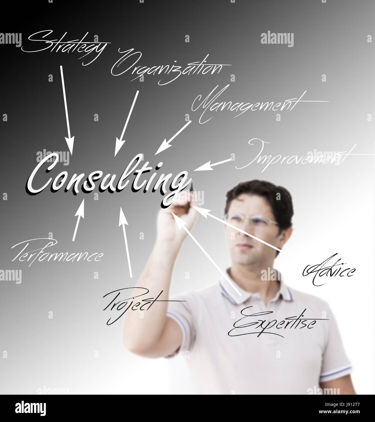 Young man planning consulting activity by writing many words connected ...