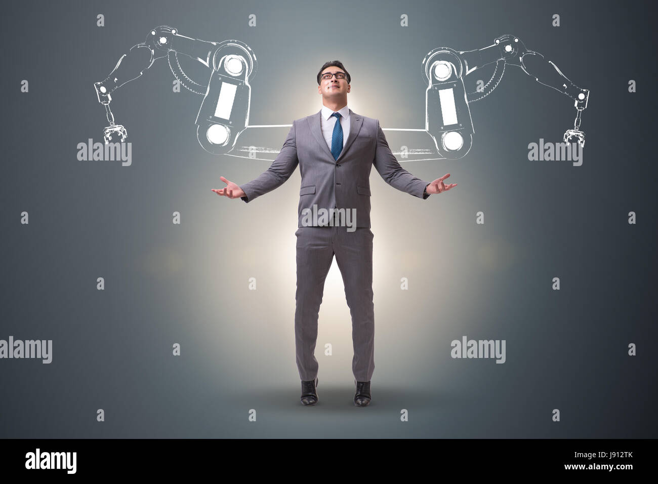 Businessman man with robotic arms Stock Photo - Alamy