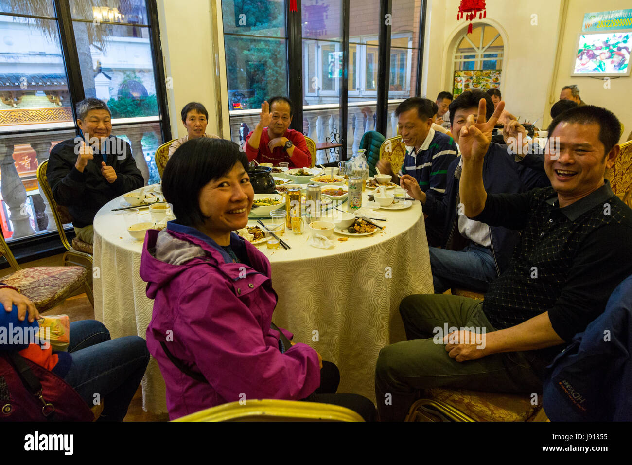 Guilin, China. Chinese Friends at Dinner in a Restaurant Stock Photo ...