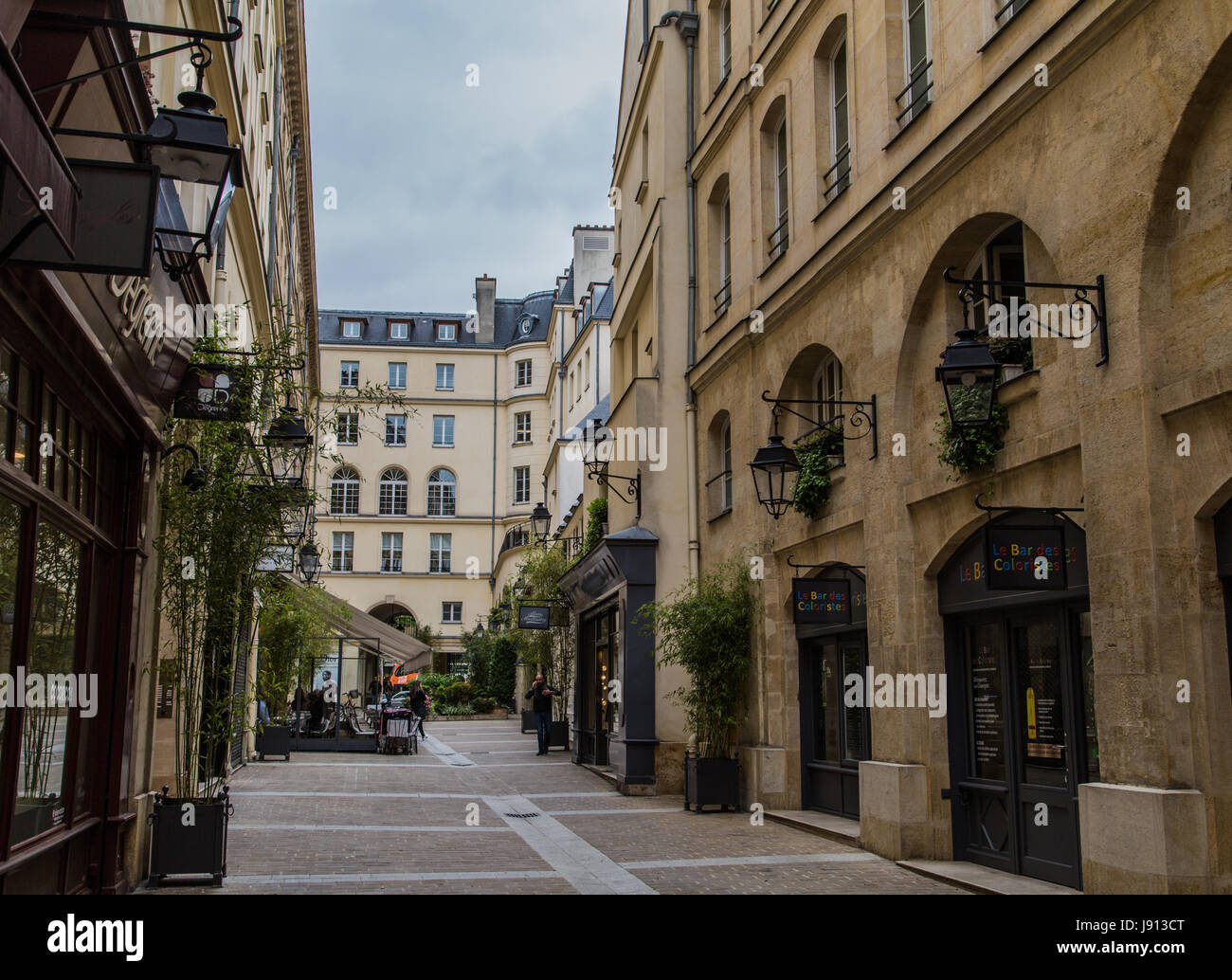 A courtyard in the 2nd Arrondissement of Paris, France, with classic ...