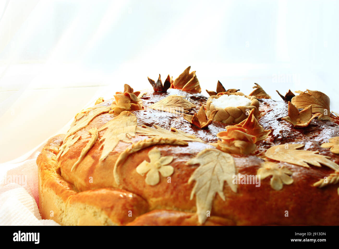 round loaf with floral patern of flowers and leaves Stock Photo - Alamy