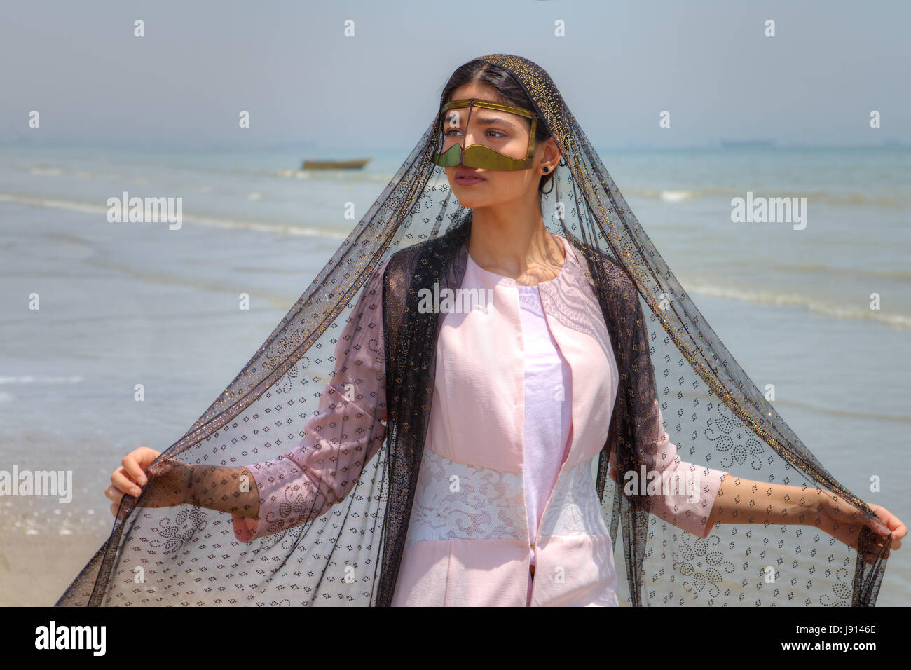 Bandari women wearing mask burqa hi-res stock photography and images ...