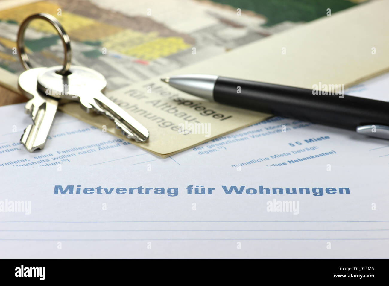 German lease contract with rent index on desktop Stock Photo - Alamy