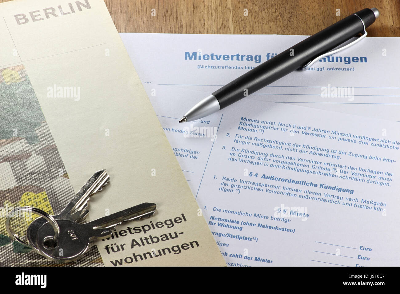 German lease contract with rent index on desktop Stock Photo - Alamy