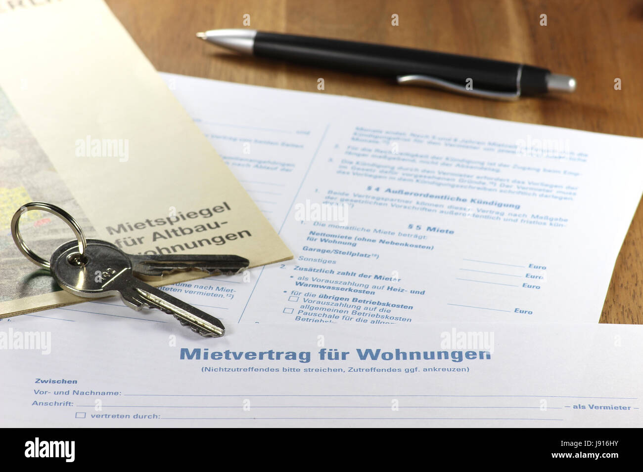 German lease contract with rent index on desktop Stock Photo - Alamy
