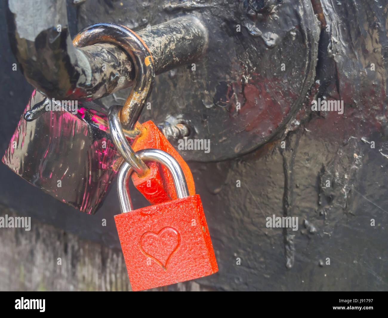 Love Lock Padlocks on Grungy Rail Stock Photo - Alamy