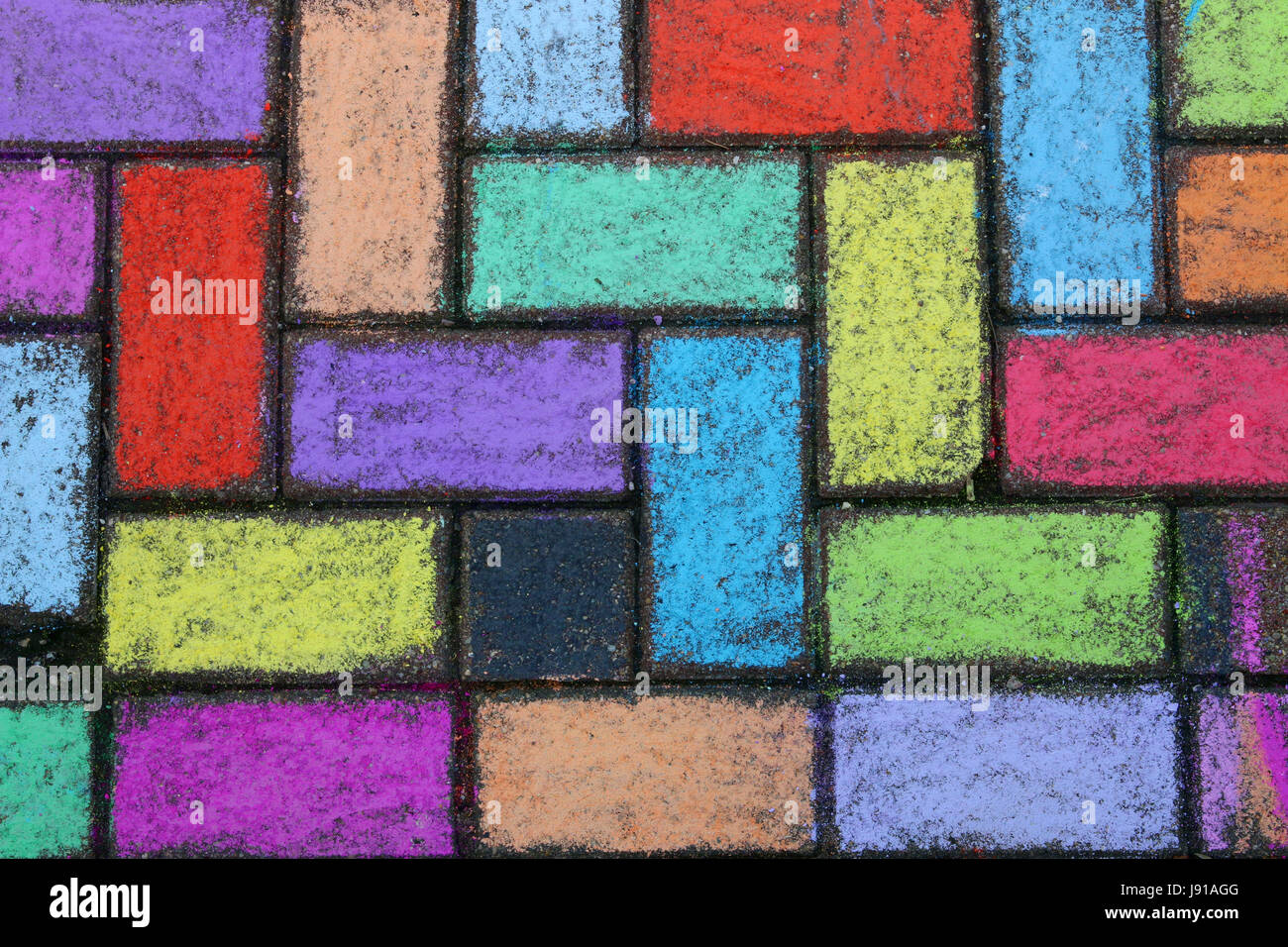 Sidewalk bricks colored with chalk Stock Photo - Alamy