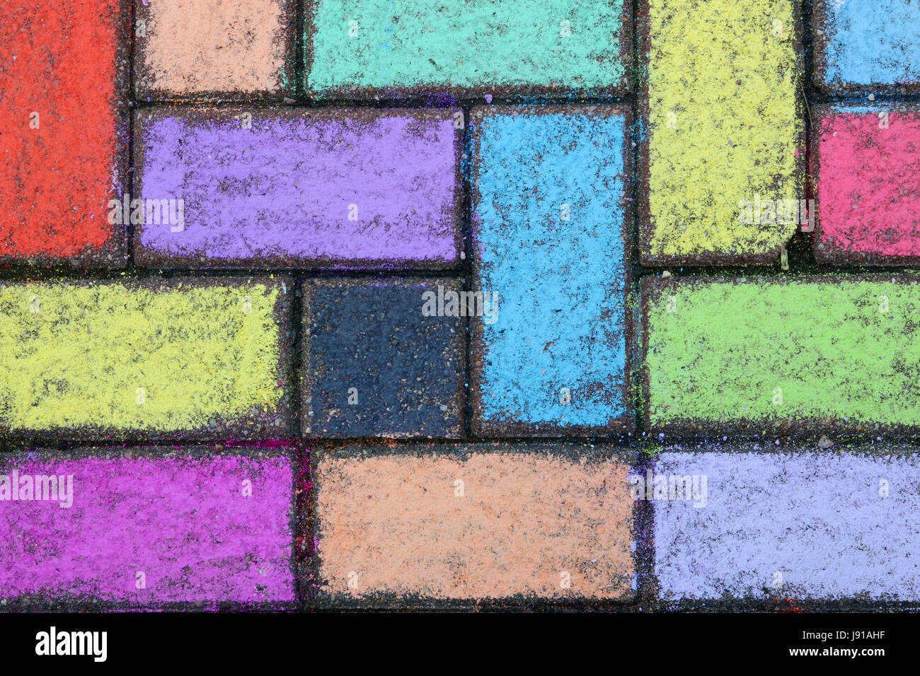 Sidewalk bricks colored with chalk Stock Photo - Alamy