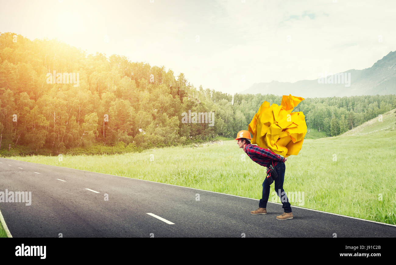 Engineer man carry load Stock Photo - Alamy