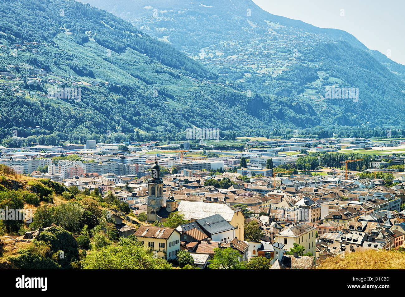 Sion cityscape with valley and Bernese Alps mountains, Valais canton ...