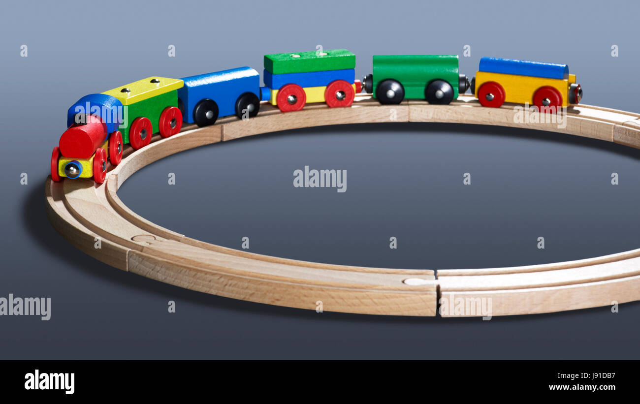 colorful wooden toy train on tracks Stock Photo - Alamy