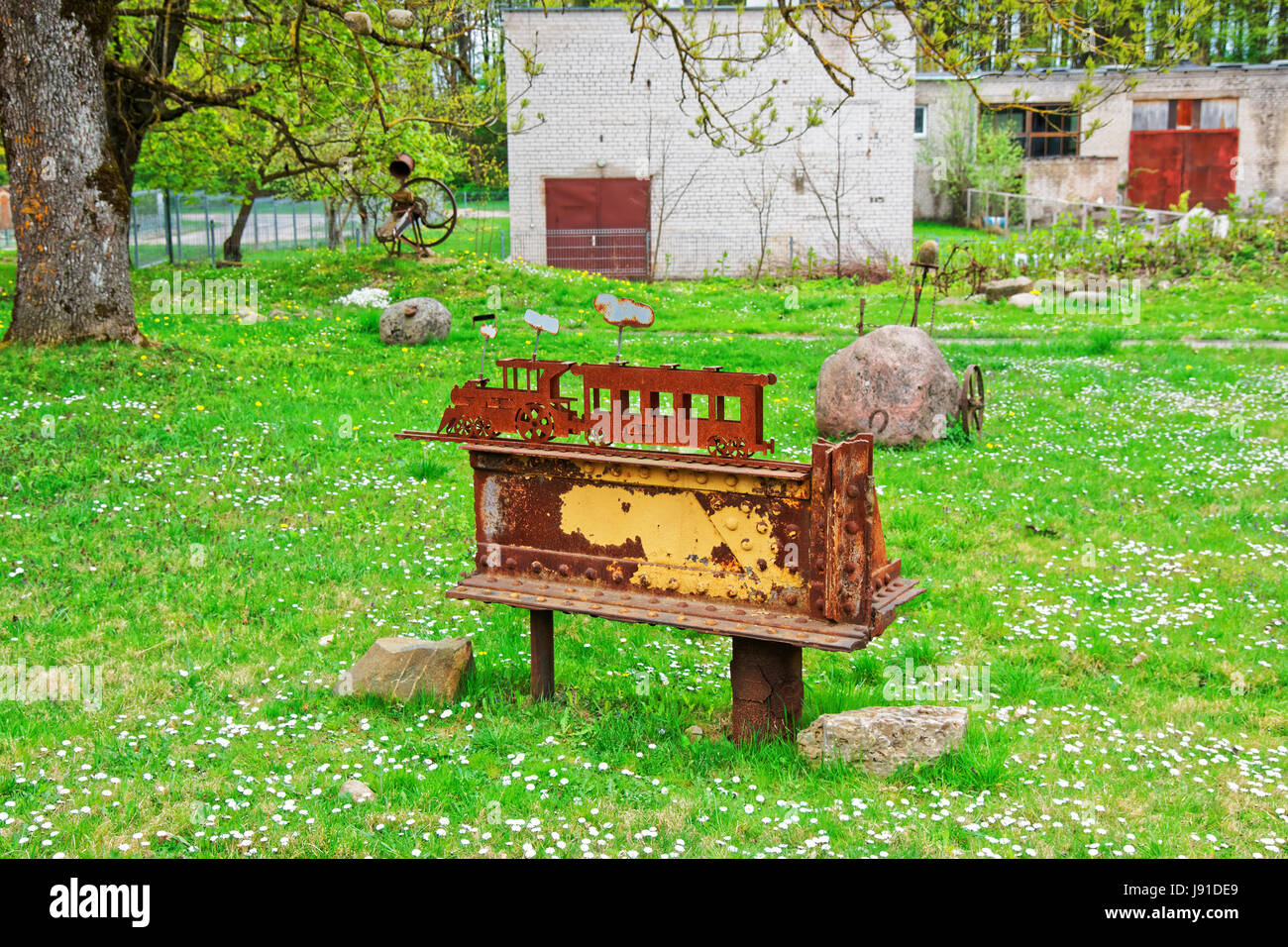 Rusty metal figures of Traku Voke public park in Vilnius, Lithuania ...