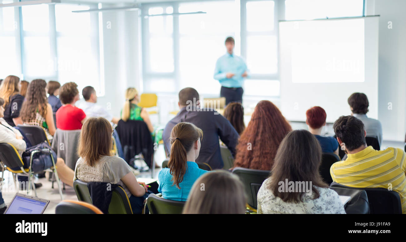 Speaker giving presentation on business conference Stock Photo - Alamy