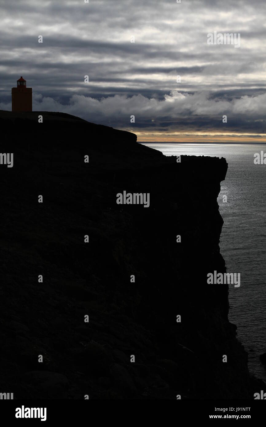 cliff with lighthouse in iceland Stock Photo - Alamy