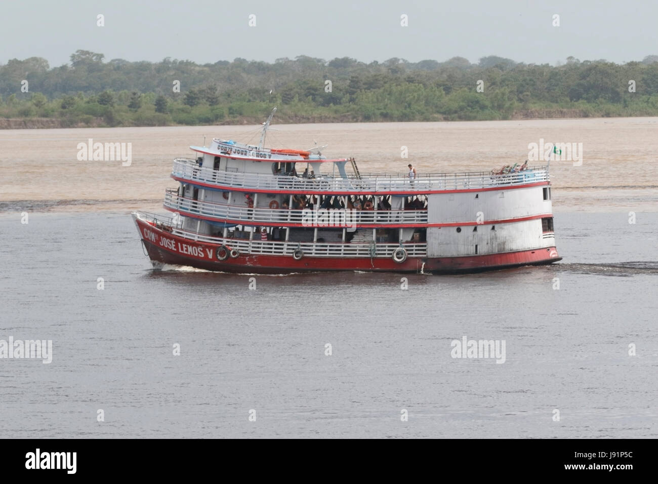 river boat sailing on meeting of the waters, Manaus, Brazil Stock Photo ...