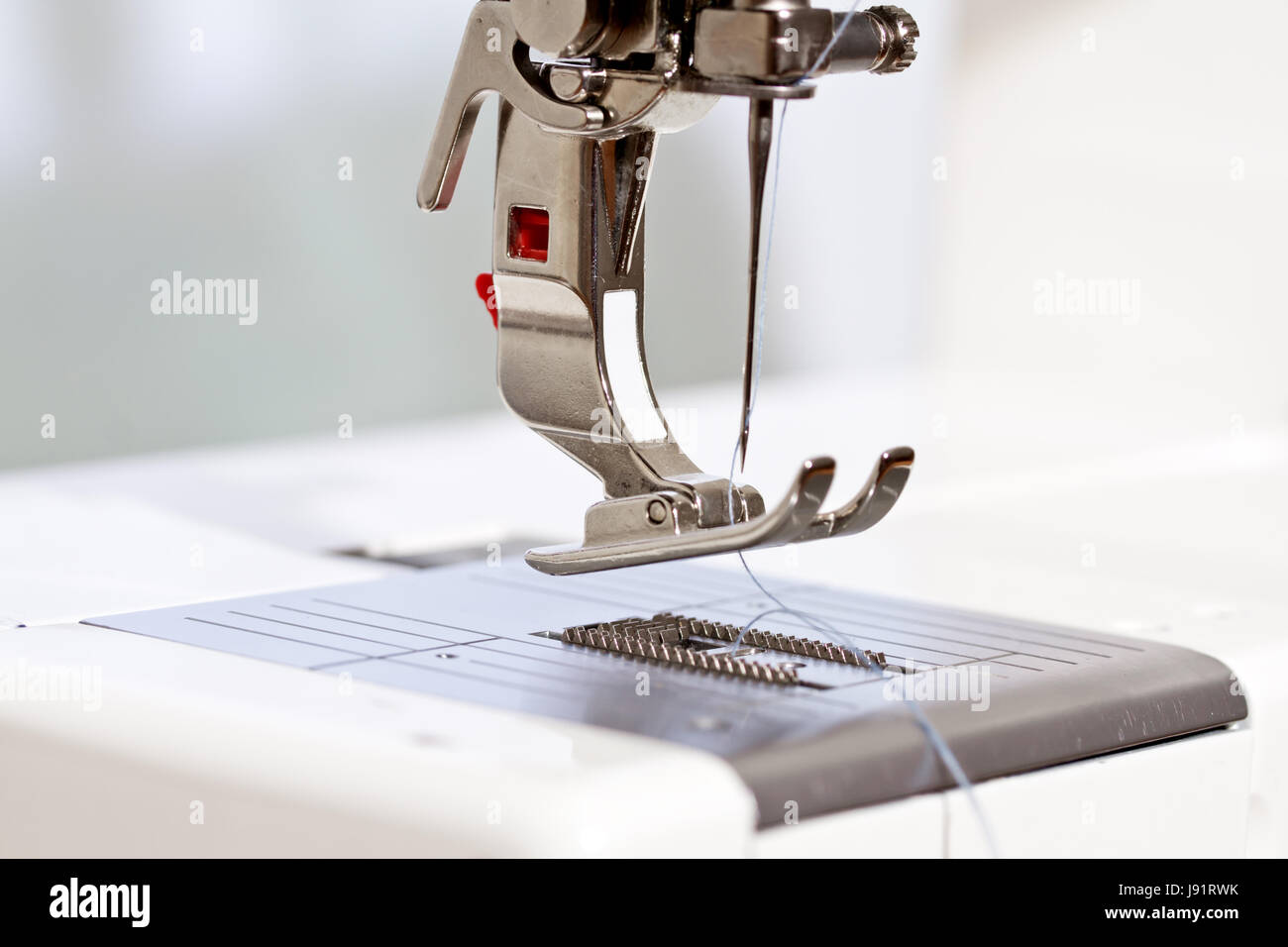 Figure sewing machine hi-res stock photography and images - Alamy