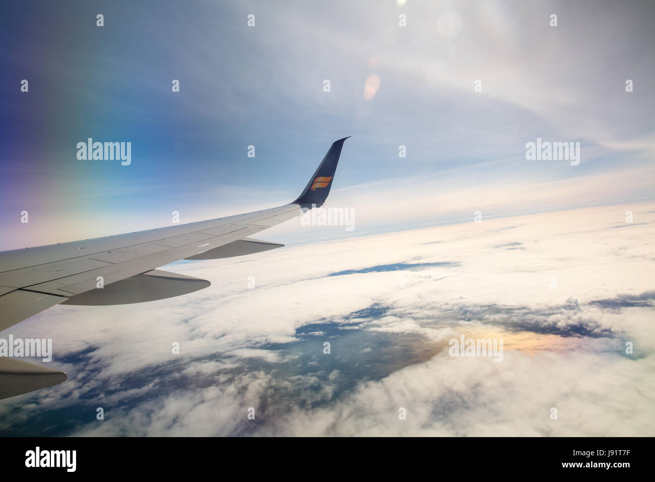 Sea of clouds. Aerial view of Atlantic ocean from Icelandair plane ...