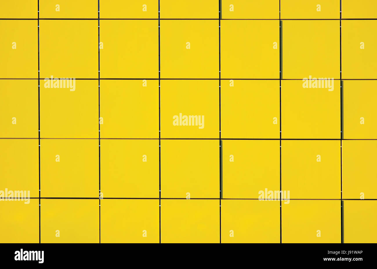 Bright Yellow Metallic Facade Panel Background Stock Photo - Alamy