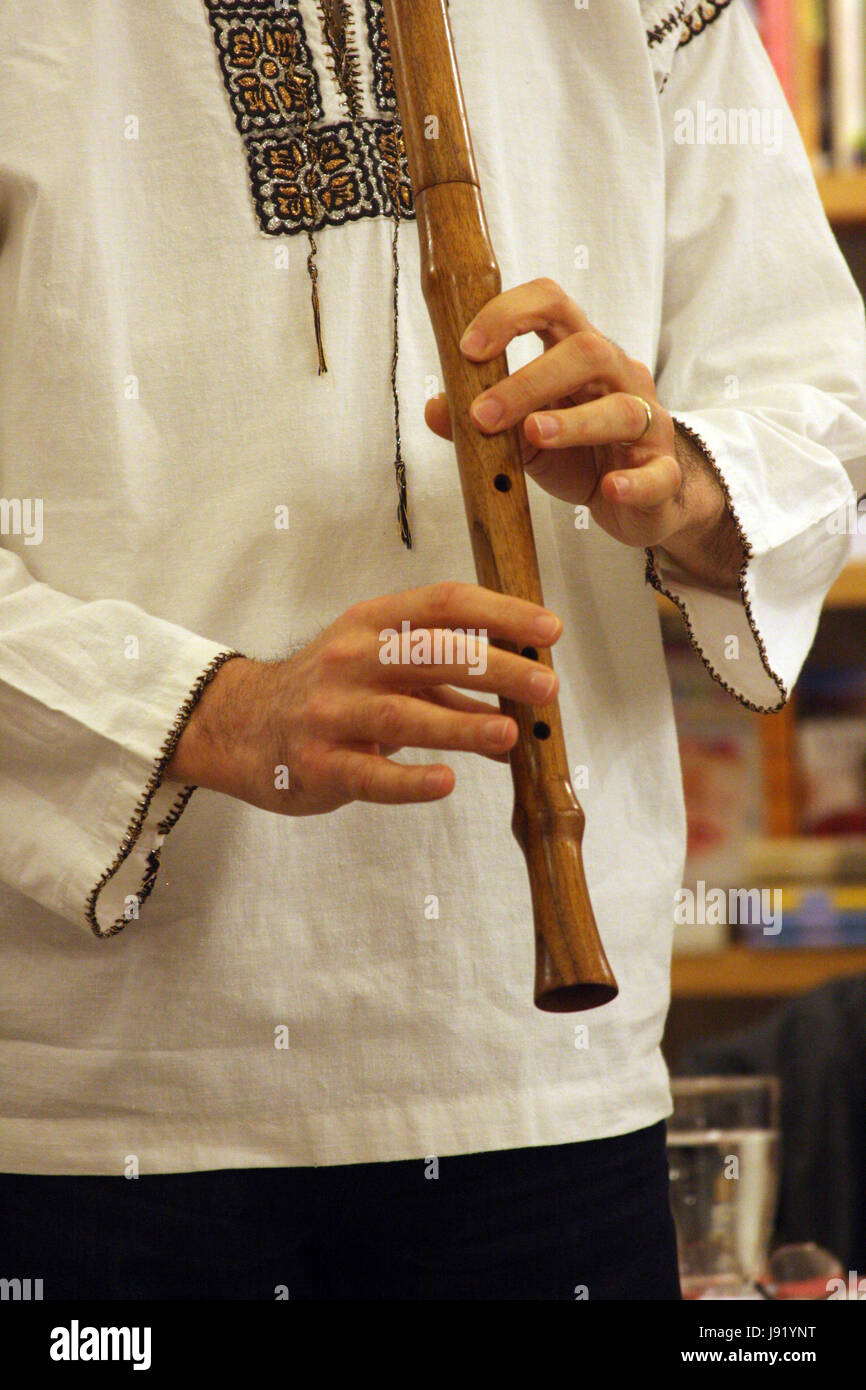 Musical instrument flute and hands hi-res stock photography and images ...