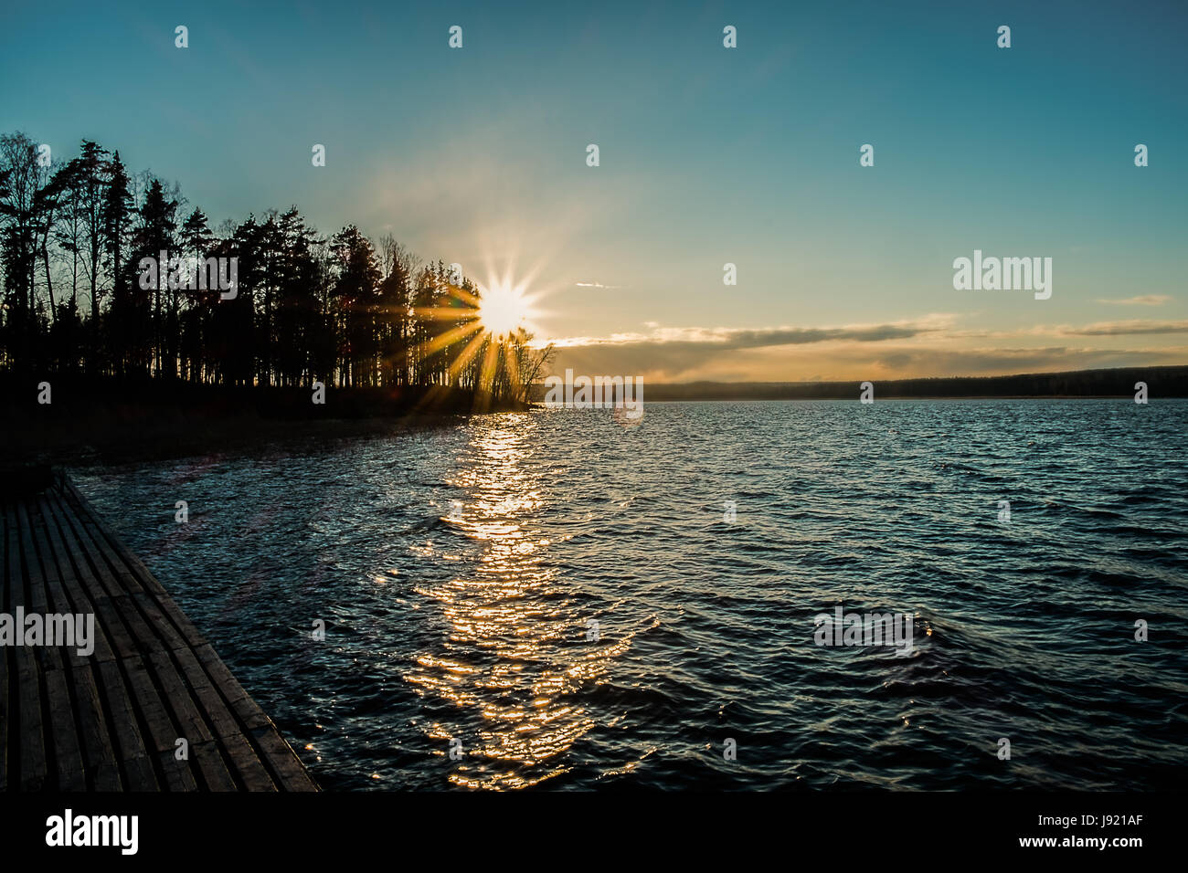 Bright yellow sun reflected in hi-res stock photography and images - Alamy
