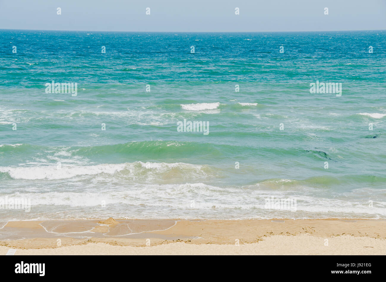 The Black Sea shore, seaside and beach with gold sands, blue water and ...