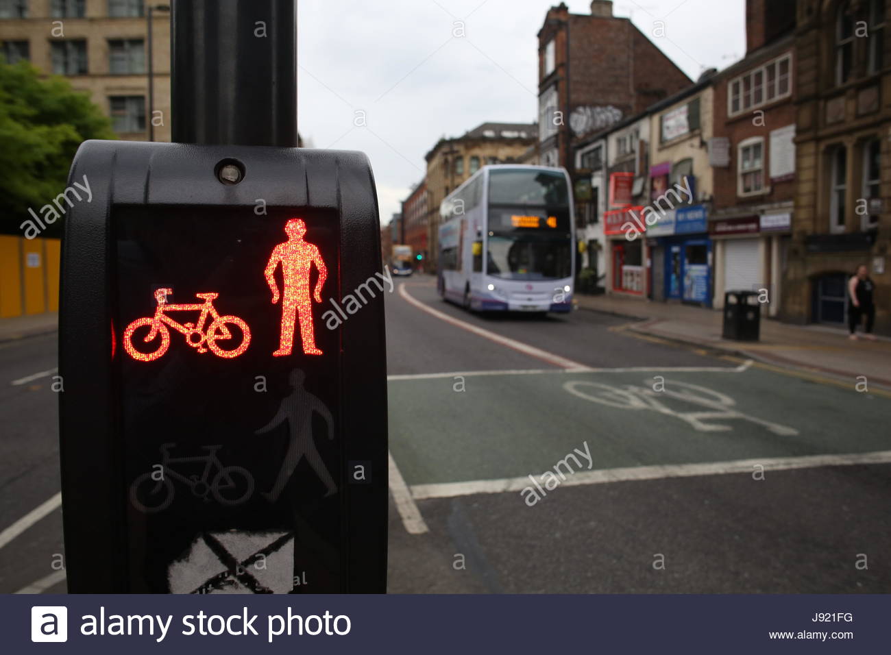 Red light at a pedestrian crossing in Manchester City centre with a ...