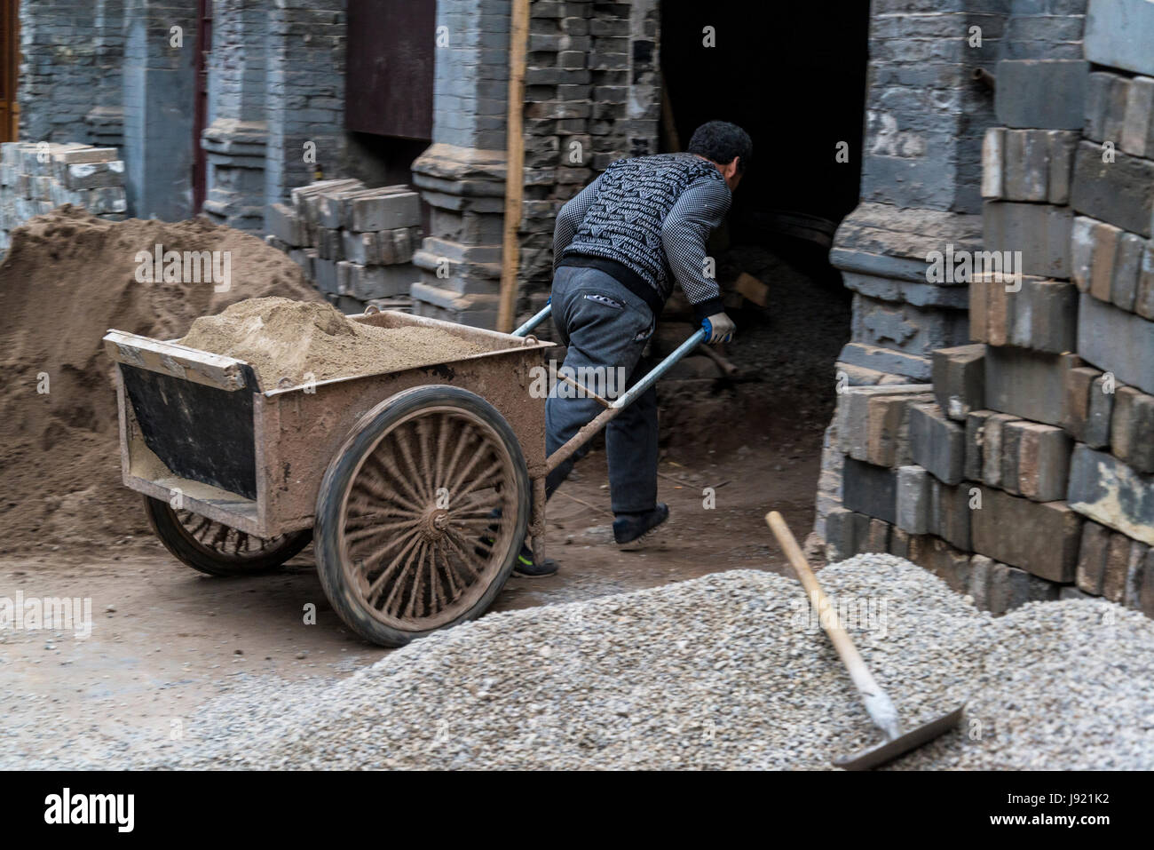 Manual labour building colour hi-res stock photography and images - Alamy