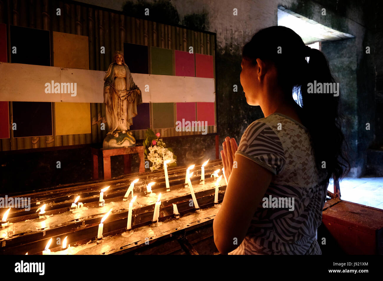 Filipino Praying In Church