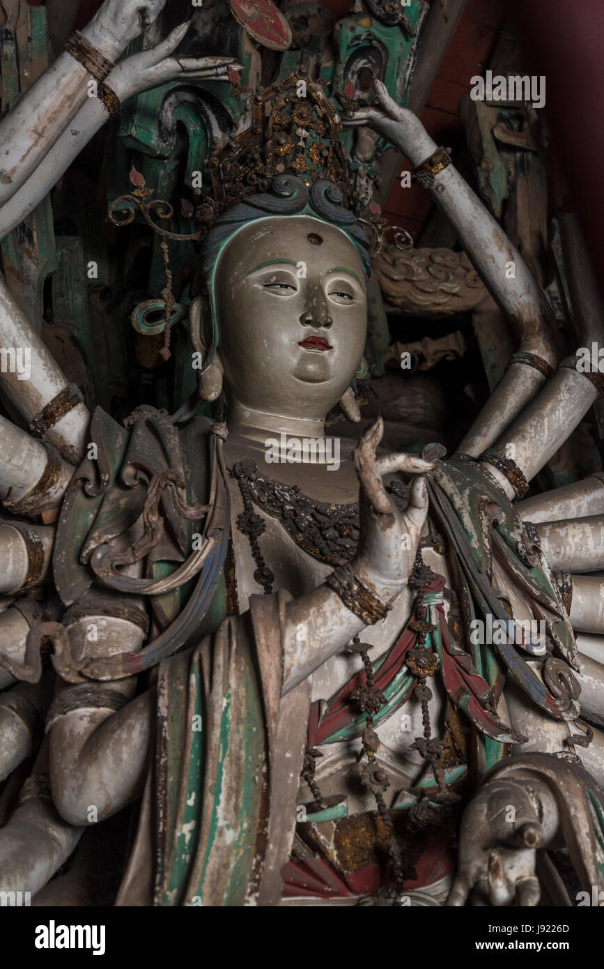 Bodhisattva sculpture with many arms in Bodhisattva Hall, Shuanglin ...