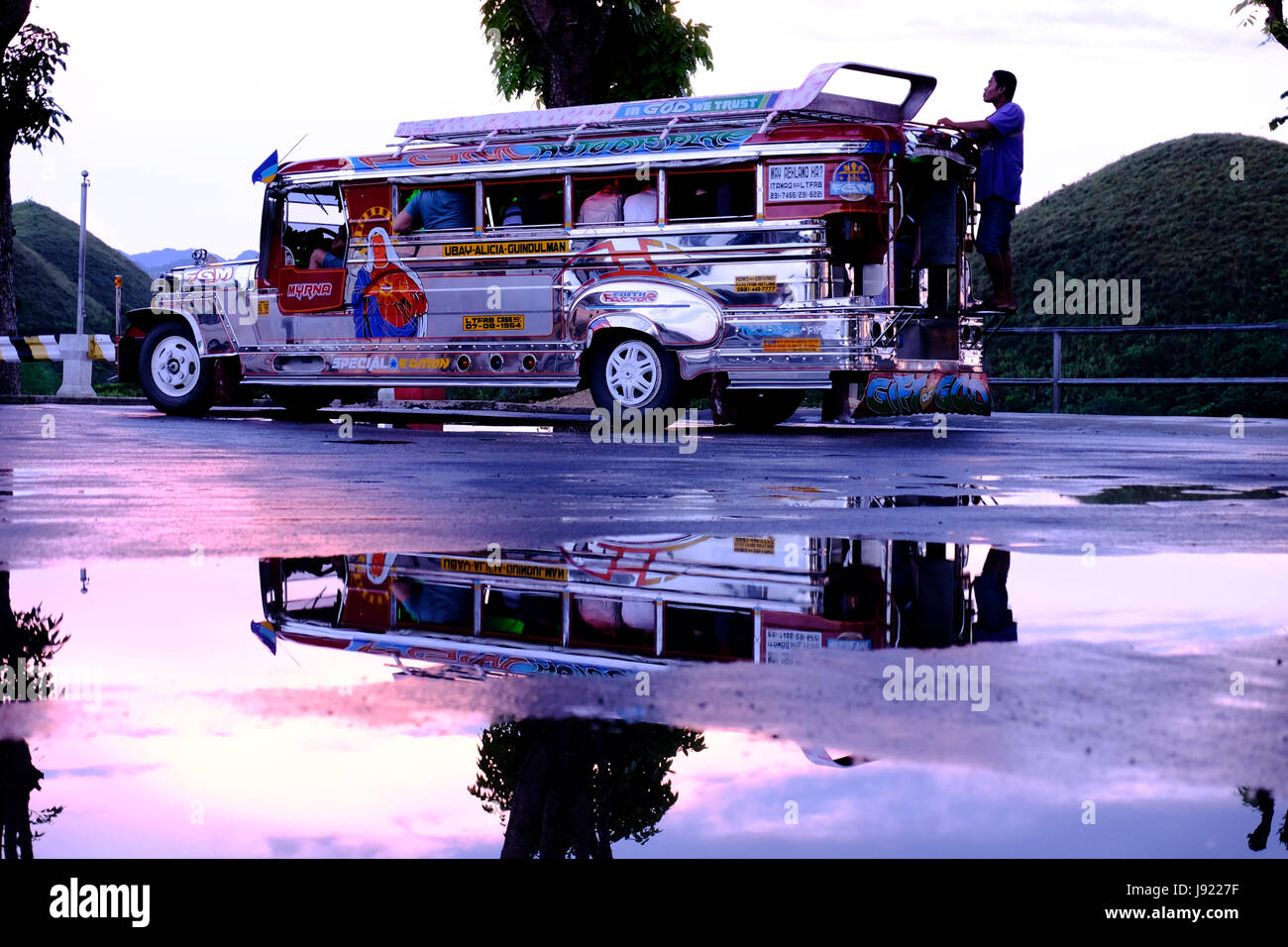 A multi colored Jeepney Bus in the island of Bohol located in the ...