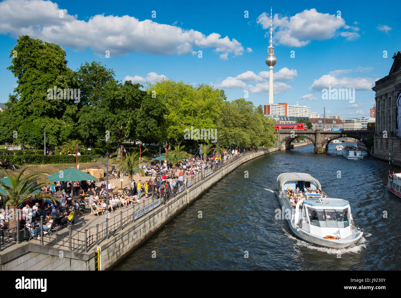Outdoor riverside bar in Monbijoupark beside Spree River in summer in ...