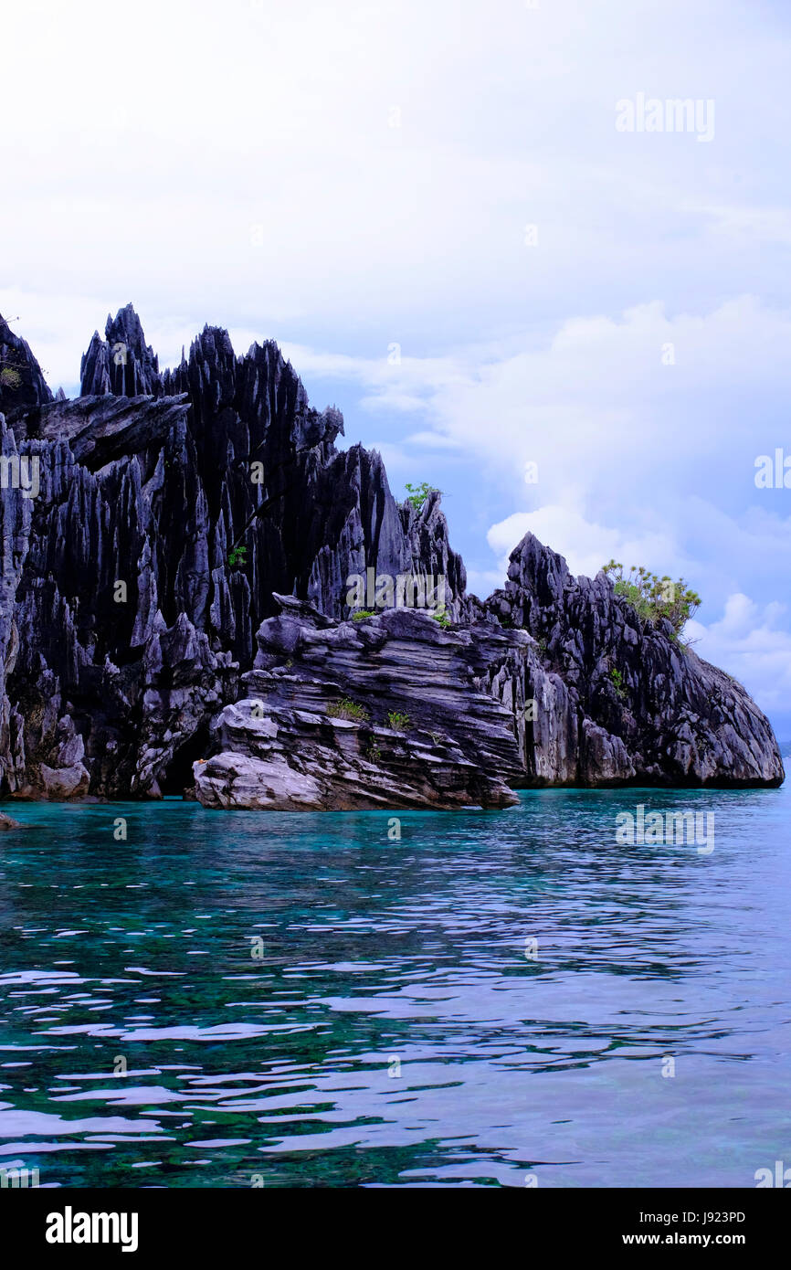 View of steep cliff Karst rock formations near Alcatraz Reef in the ...